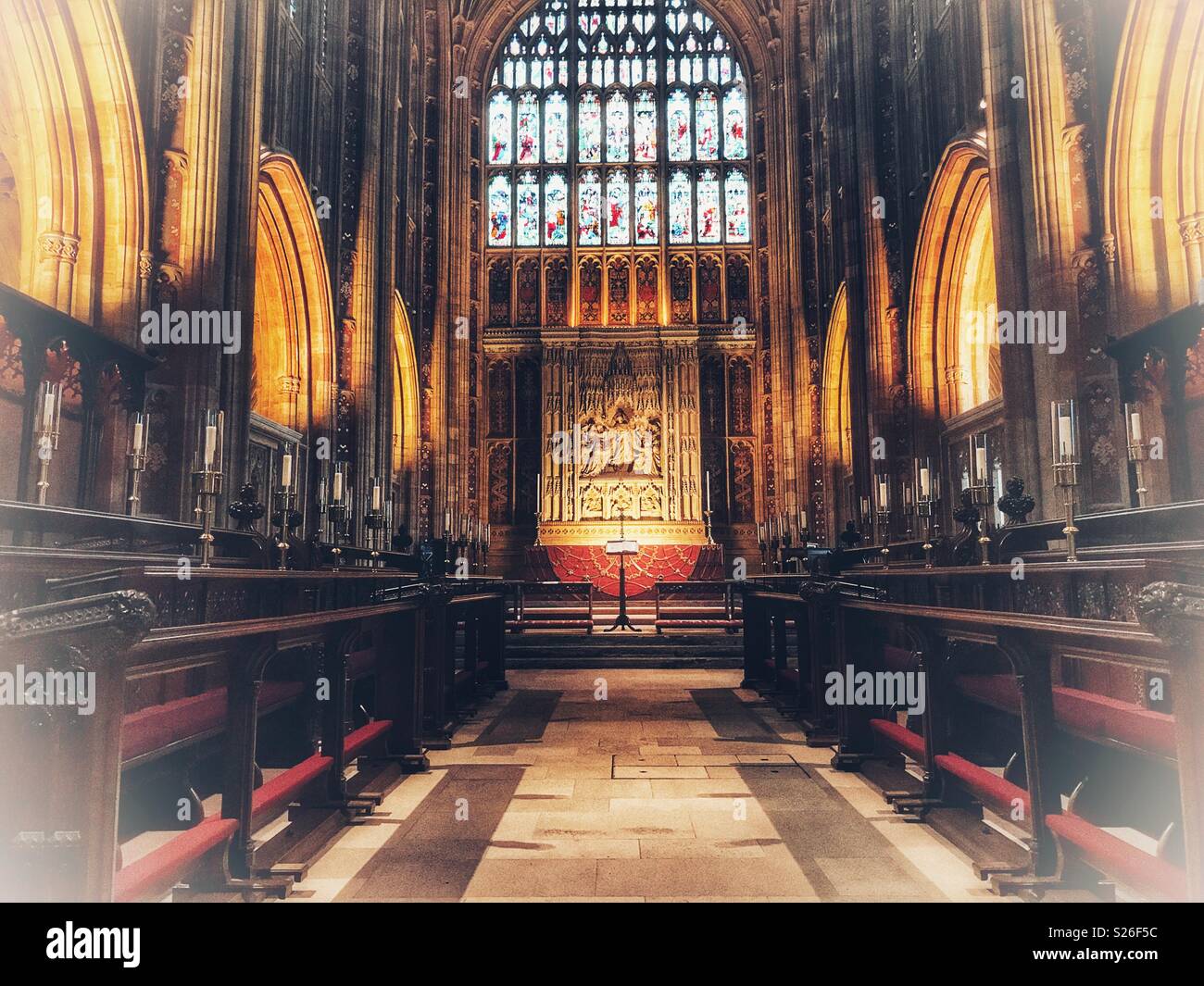Altar, choir stalls, stained glass window, in the magnificent Sherborne ...