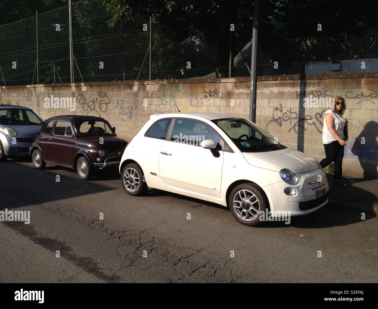 Old and new Fiat 500 parked on street in Milano, Italia, 2018 Stock ...