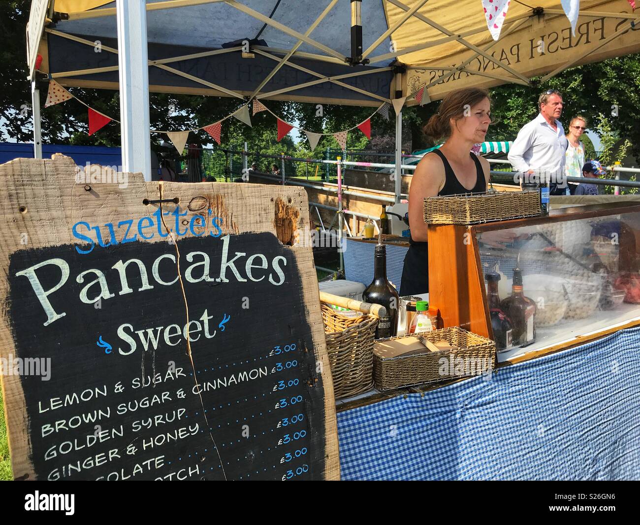Food stall selling pancakes at a country fair, UK Stock Photo - Alamy