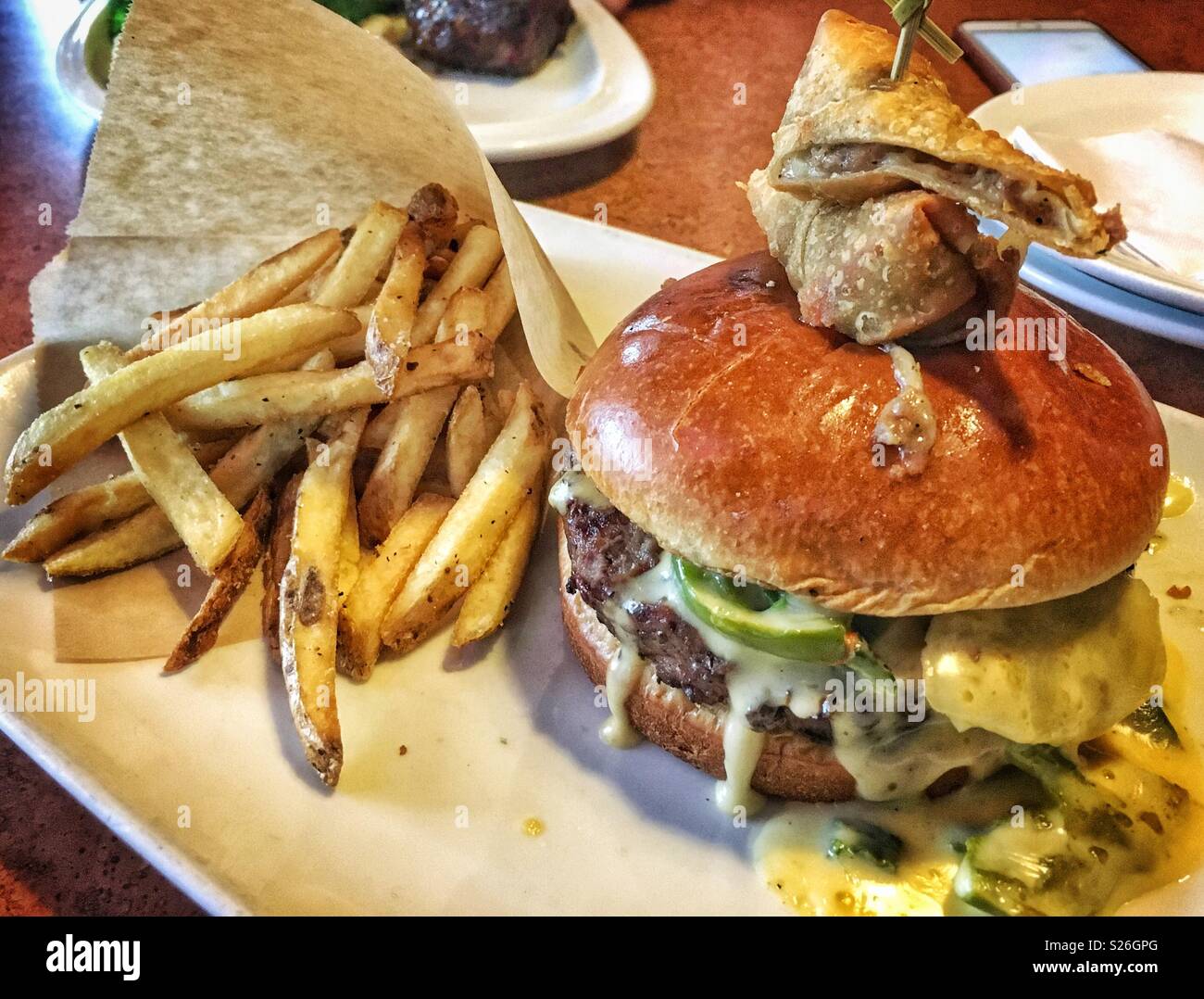 Burger and fries- tgif Stock Photo - Alamy