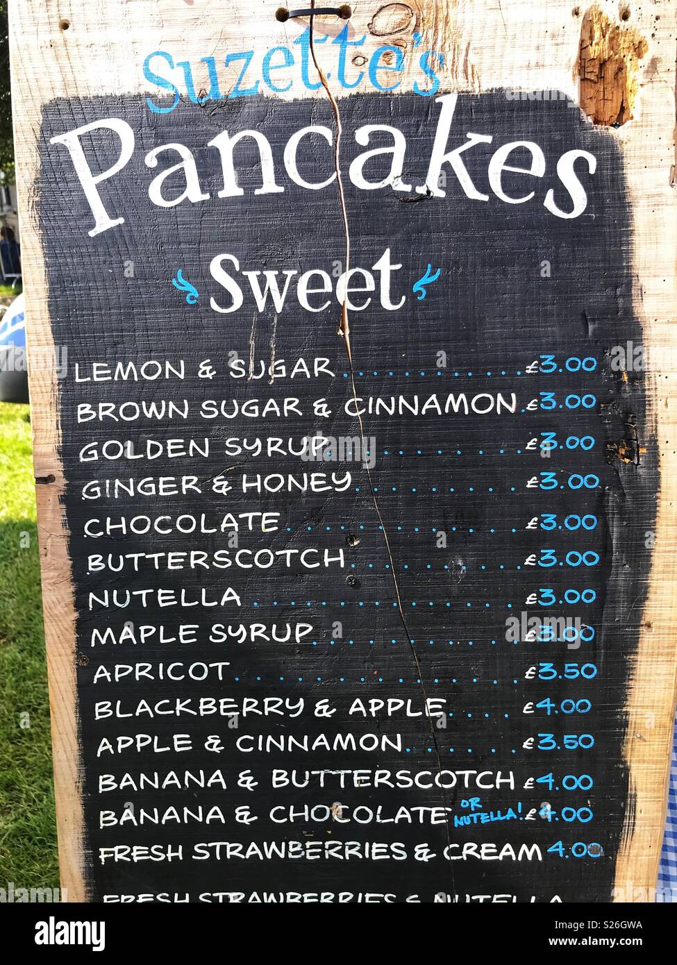 Blackboard menu, listing the different types of sweet pancakes ...