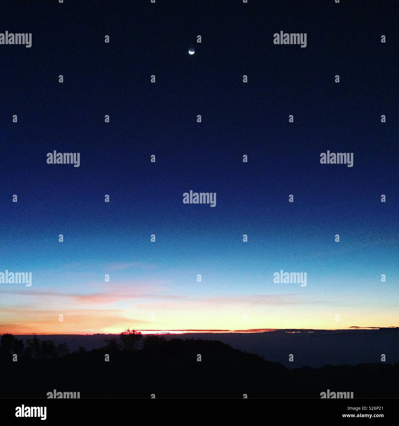 Sunrise with moon hi-res stock photography and images - Alamy