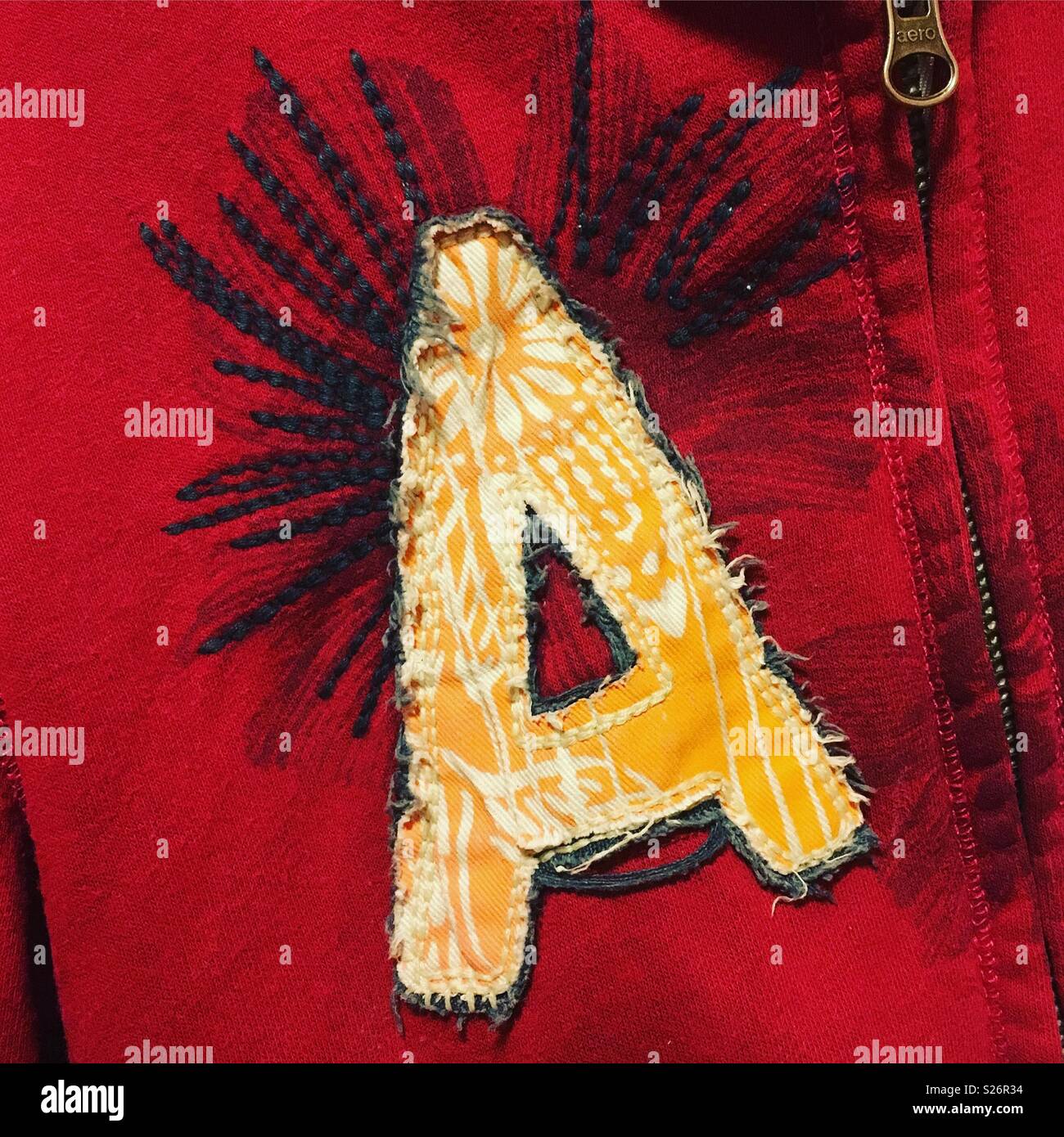 The letter A stitched on a hoodie jacket Stock Photo - Alamy