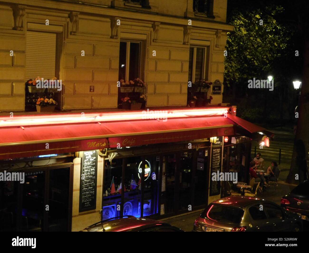 Neon signs of Parisian café Stock Photo - Alamy