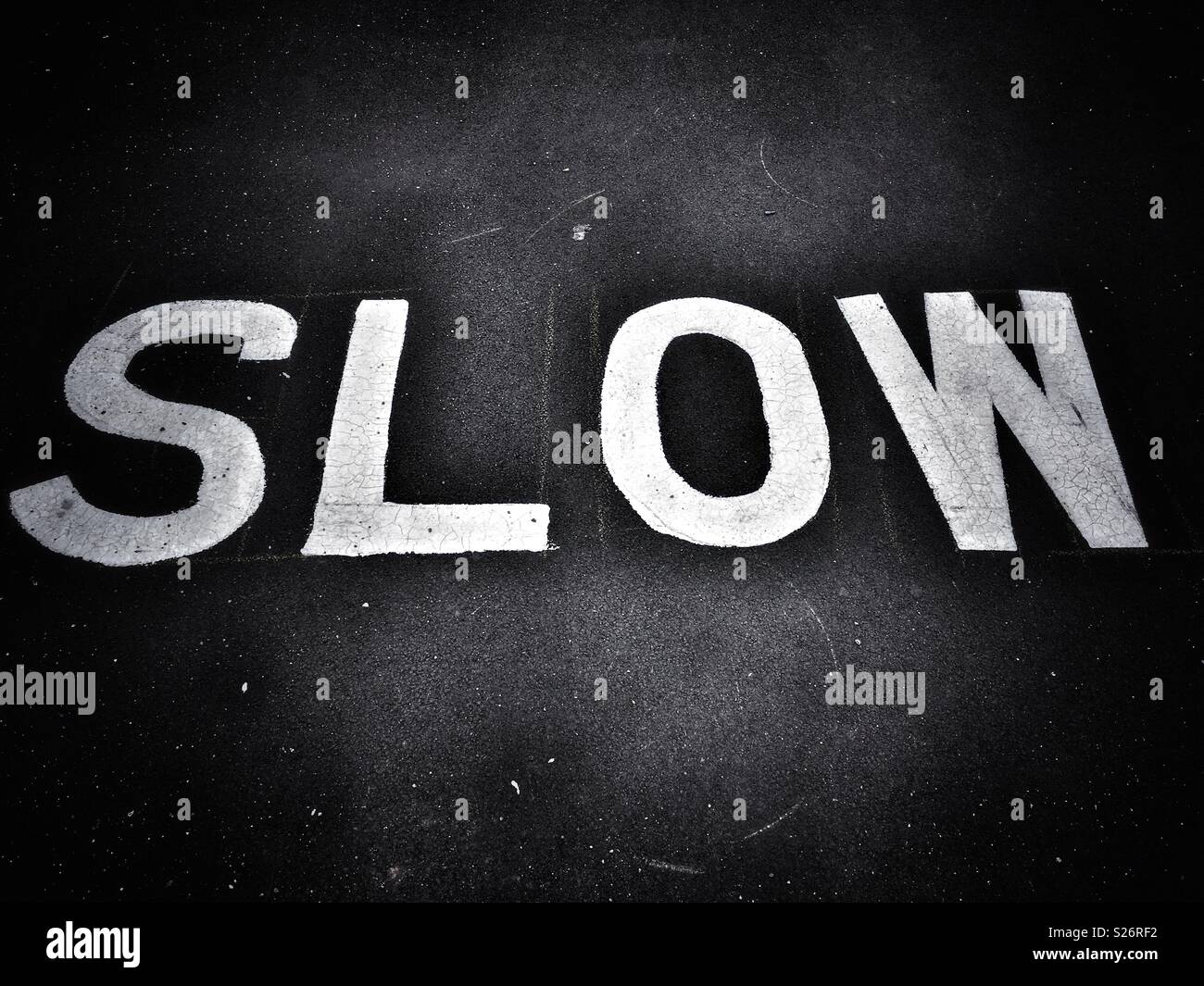 Slow writing on tarmac Stock Photo - Alamy