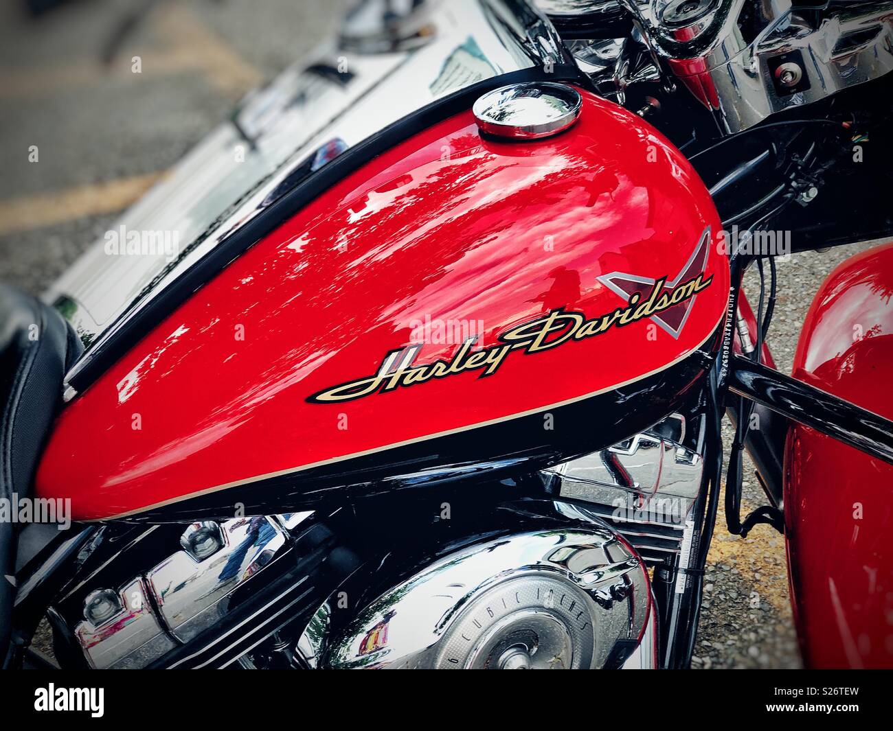 Bright red gas tank of iconic Harley Davidson bike Stock Photo - Alamy