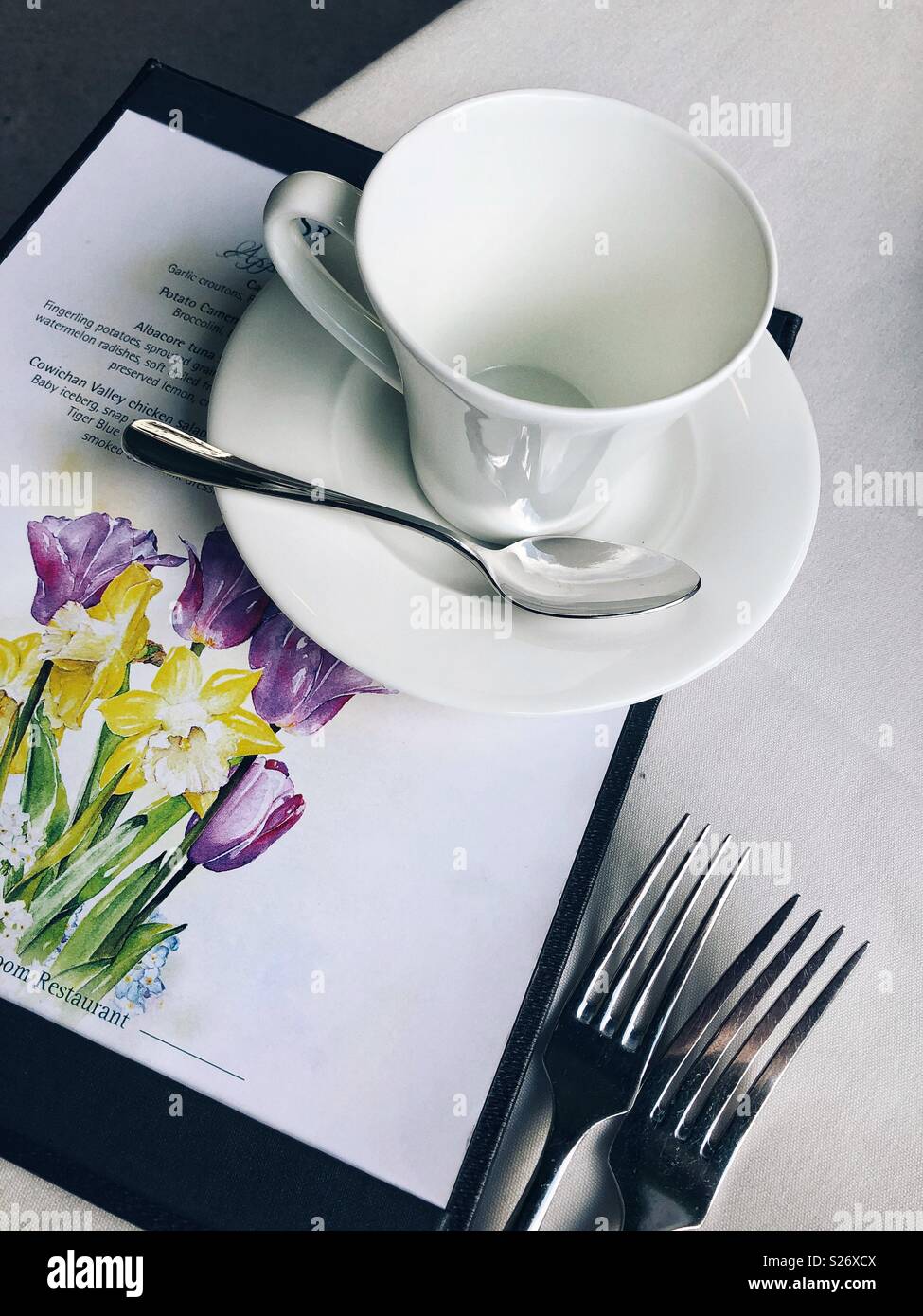 Waiting for lunch with a menu Stock Photo - Alamy
