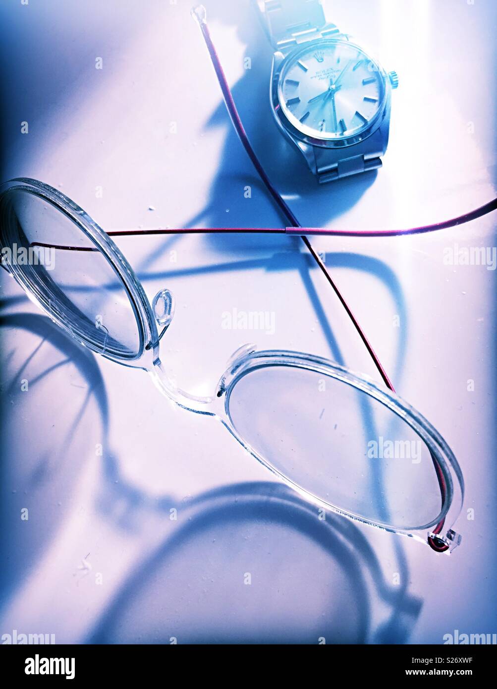 Eyeglasses and watch on a bathroom sink, USA Stock Photo - Alamy