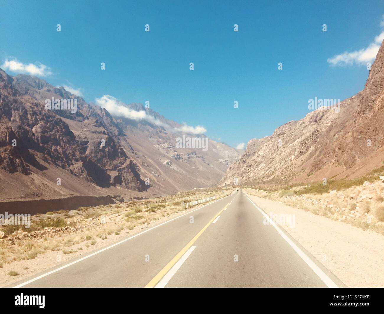 Open road highway road trip through the mountains on clear road Stock ...