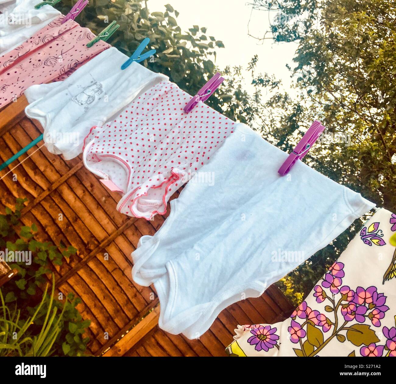 Baby Clothes Washing Line High Resolution Stock Photography and Images ...