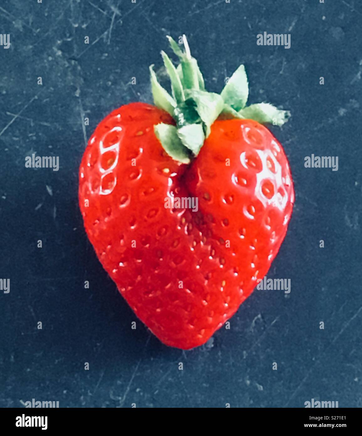 Heart shaped strawberry Stock Photo - Alamy