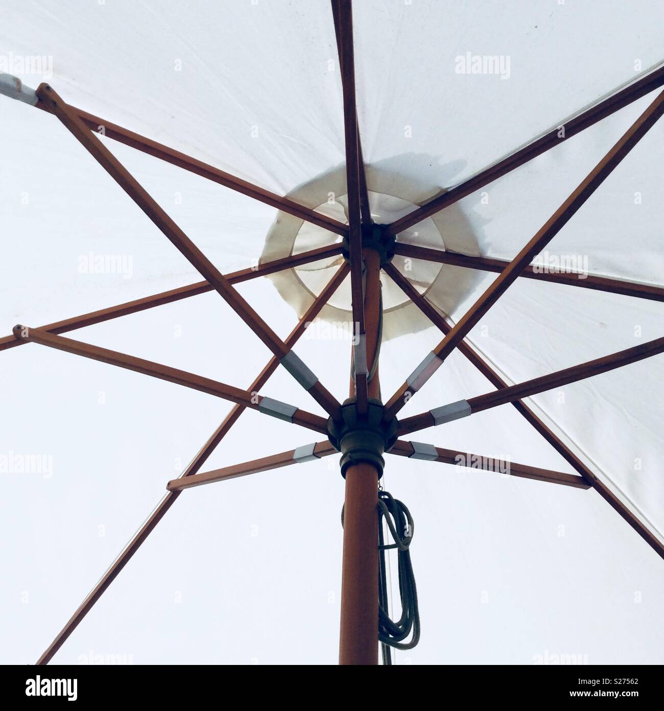 Low angle view from the inside of an umbrella with white fabric Stock ...