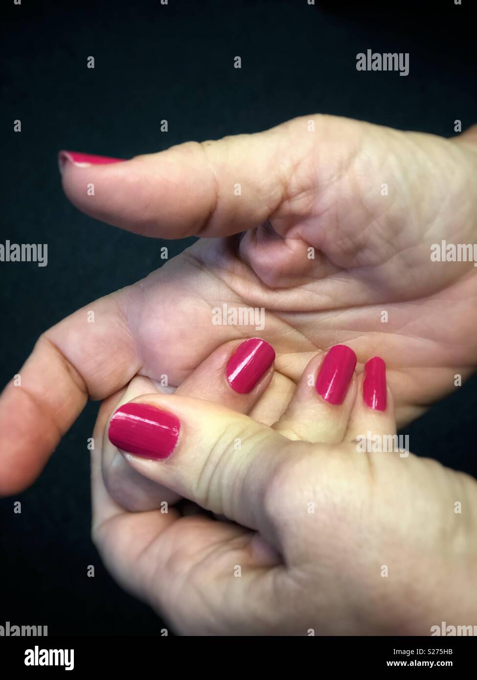 Female popping knuckles hi-res stock photography and images - Alamy