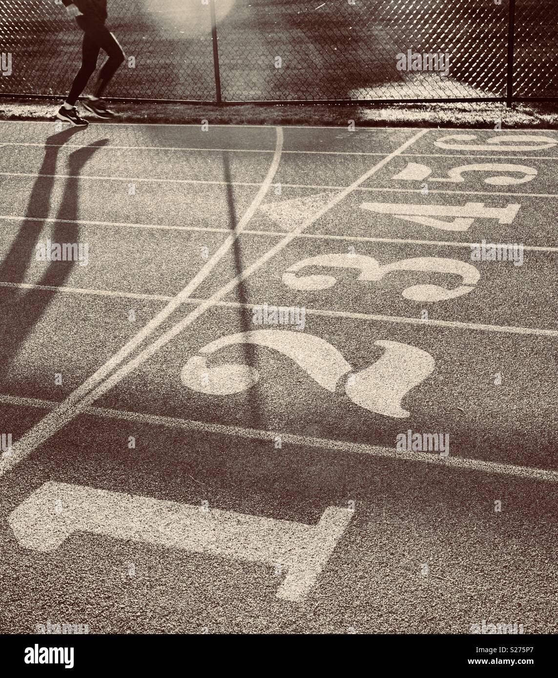Running by the Numbers Stock Photo - Alamy