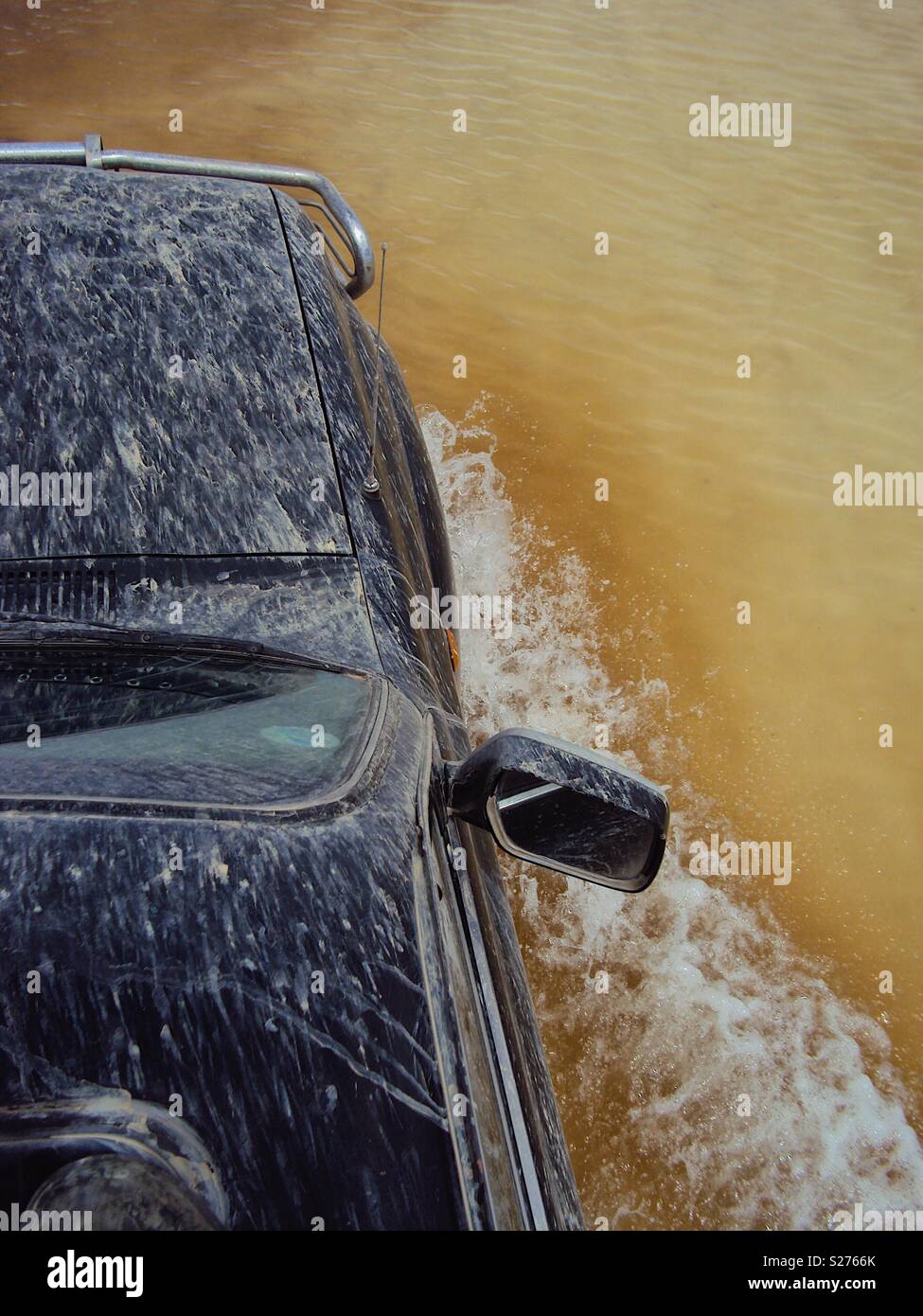Truck driving through water hi-res stock photography and images - Alamy