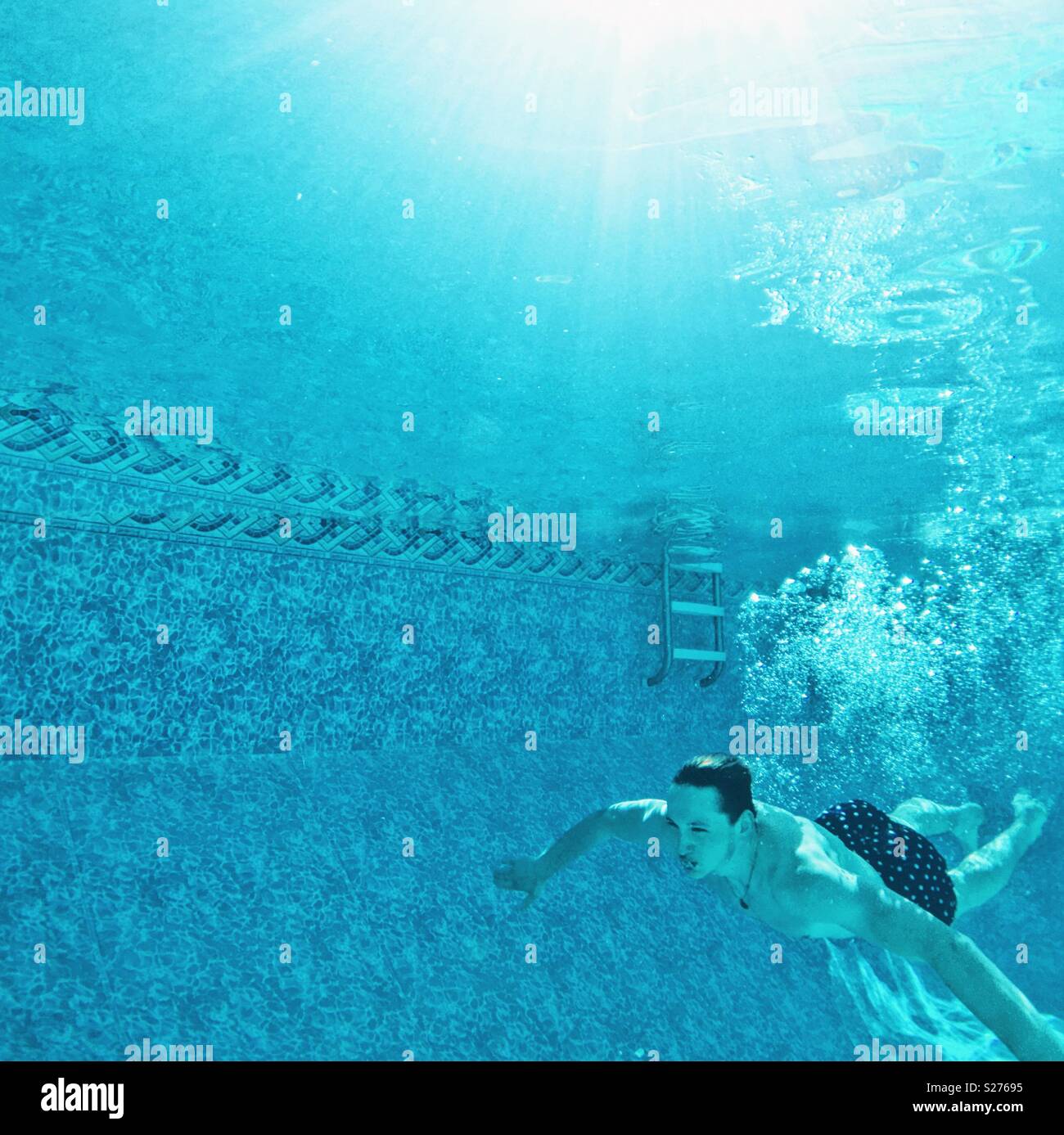 Man swimming underwater hi-res stock photography and images - Alamy