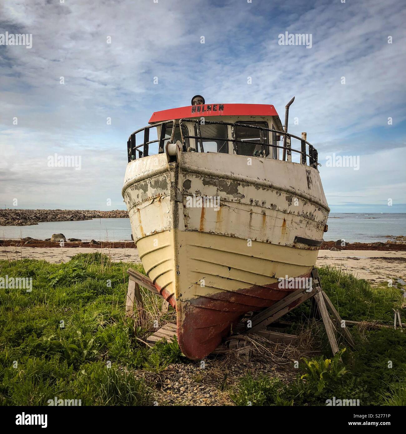 Beached boat in Norway Stock Photo - Alamy