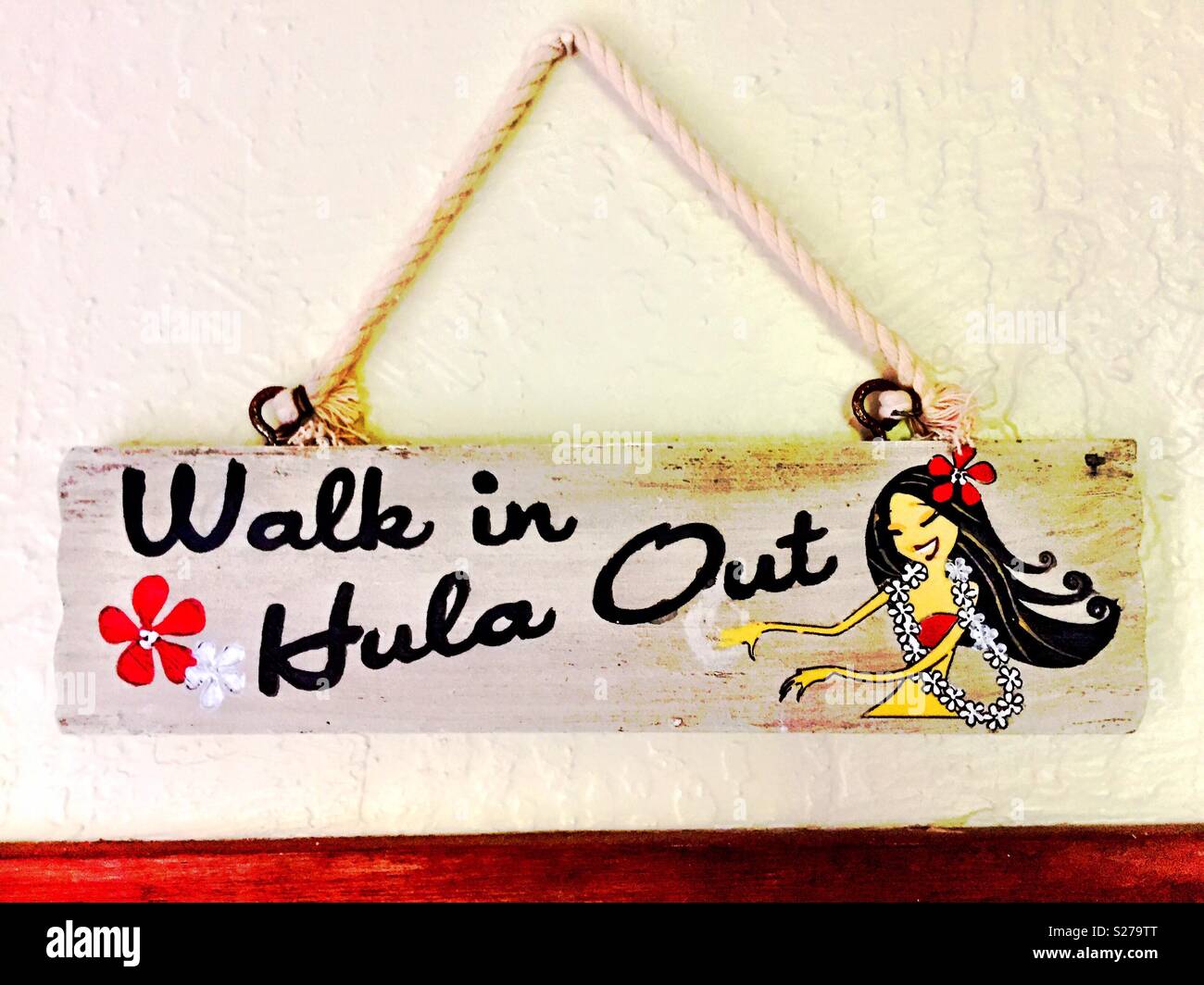 Walk in, hula out. Traditional Hawaiian entryway greeting Stock Photo ...