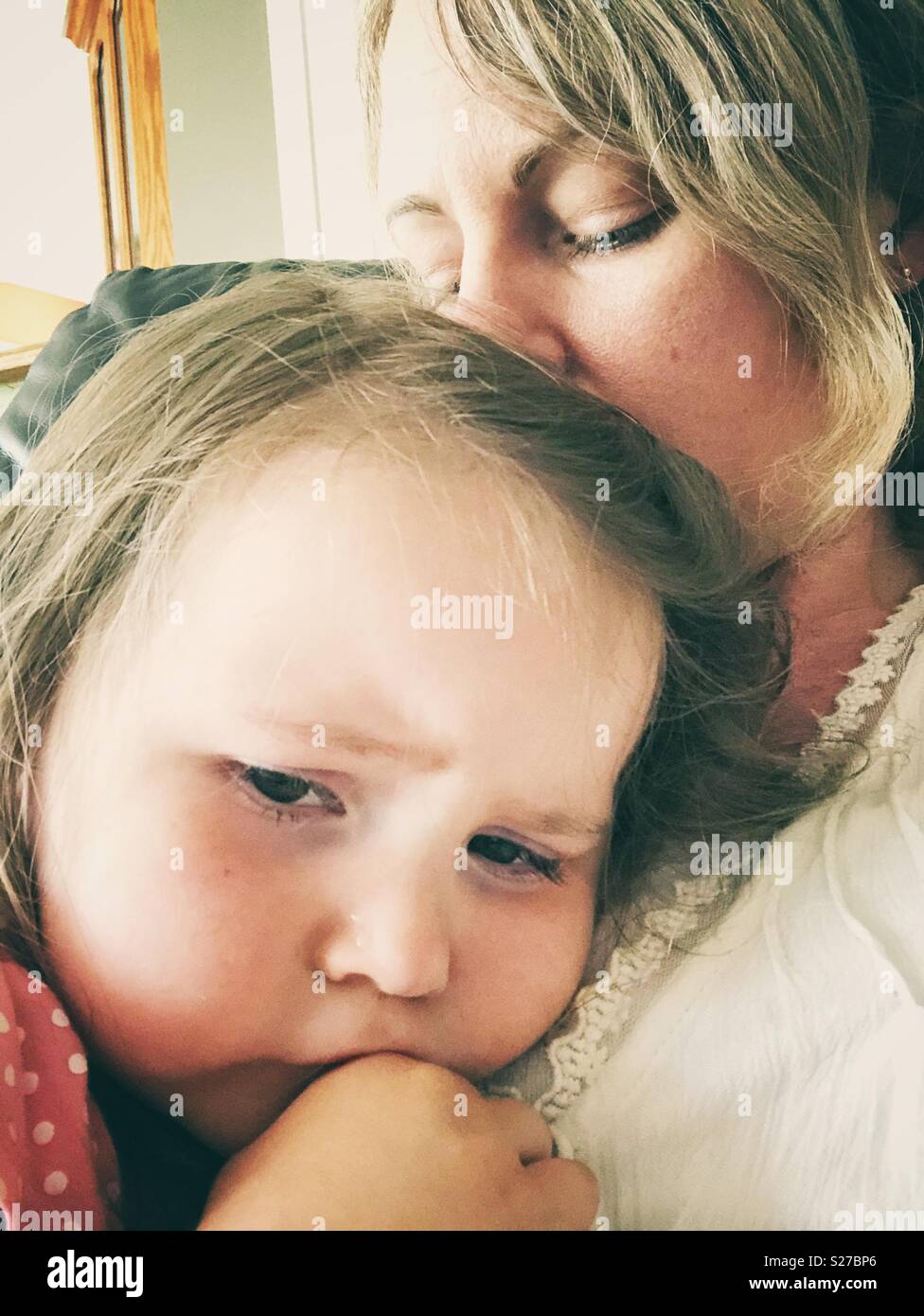 Crying mother and child hi-res stock photography and images - Alamy