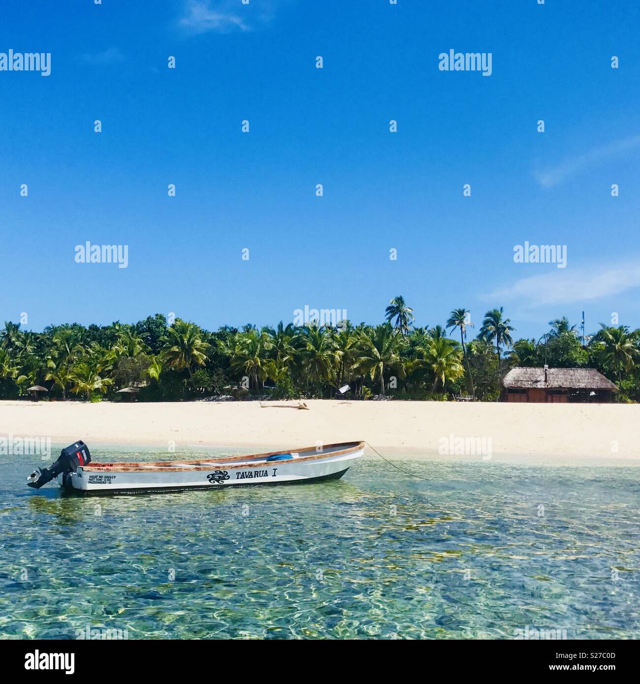 A boat anchored at Tavarua island. Tavarua island resort, Fiji Stock ...