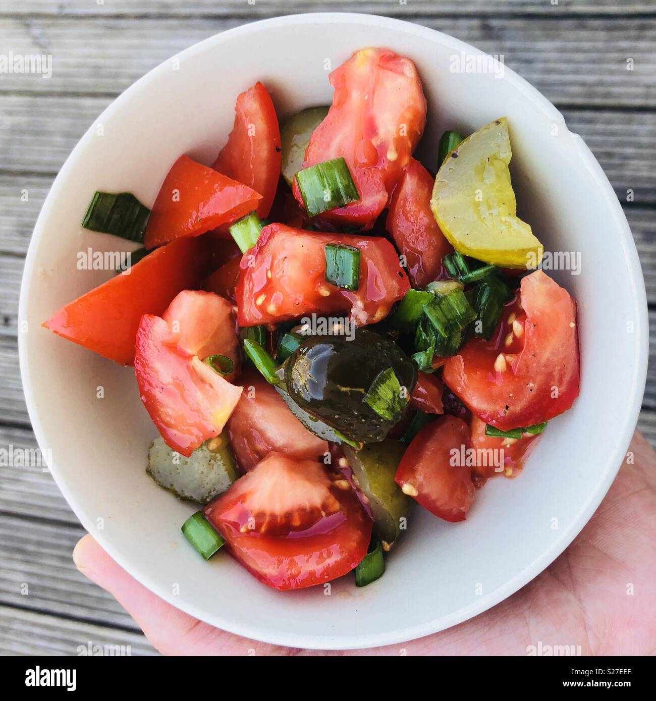 Summer salad from tomatoes and cucumbers in a bow Stock Photo - Alamy