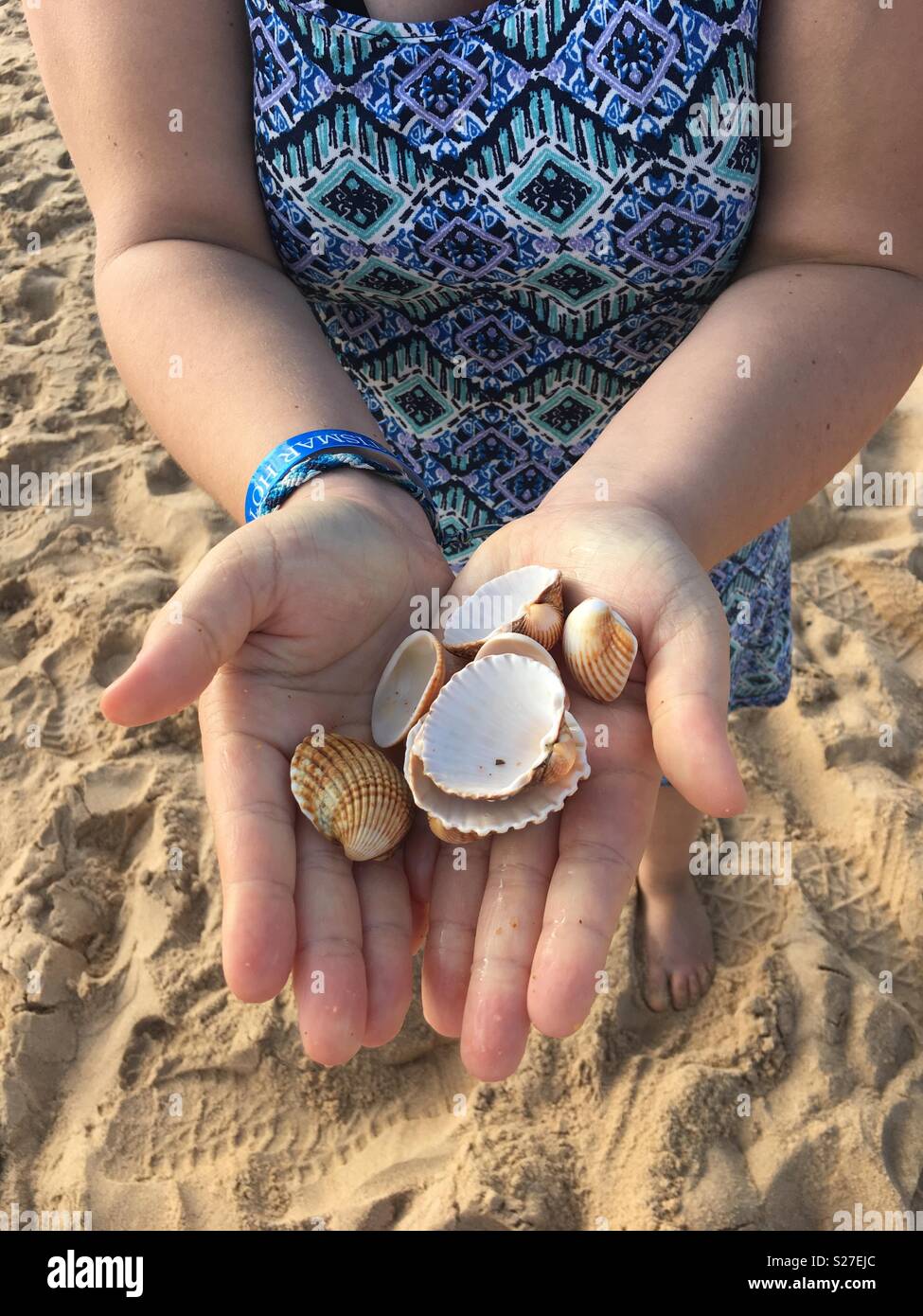 Woman shells hi-res stock photography and images - Alamy