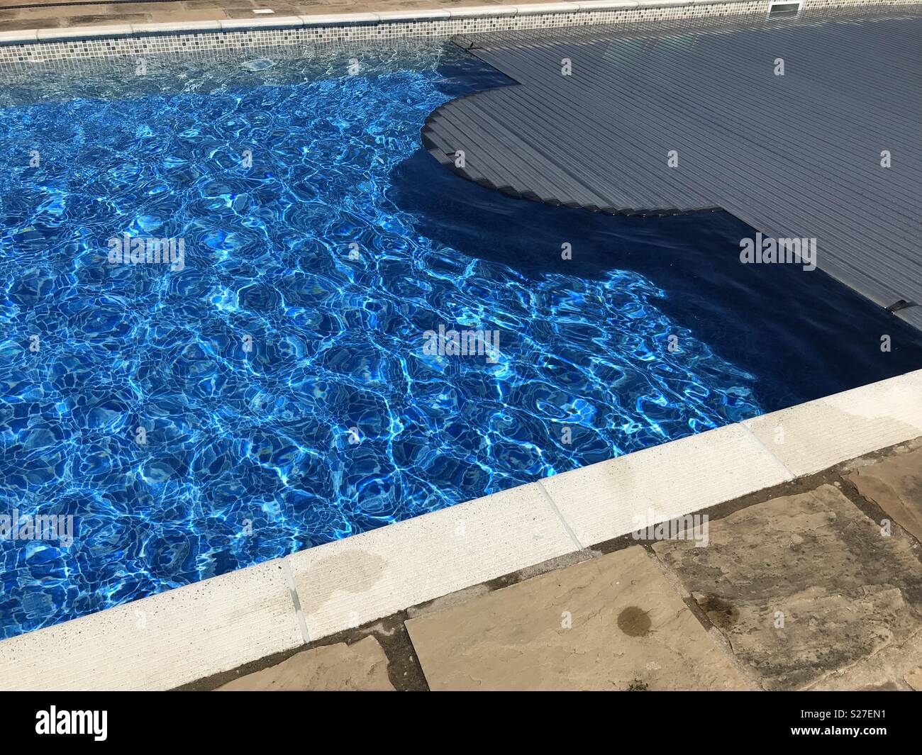 Solar pool cover hi-res stock photography and images - Alamy