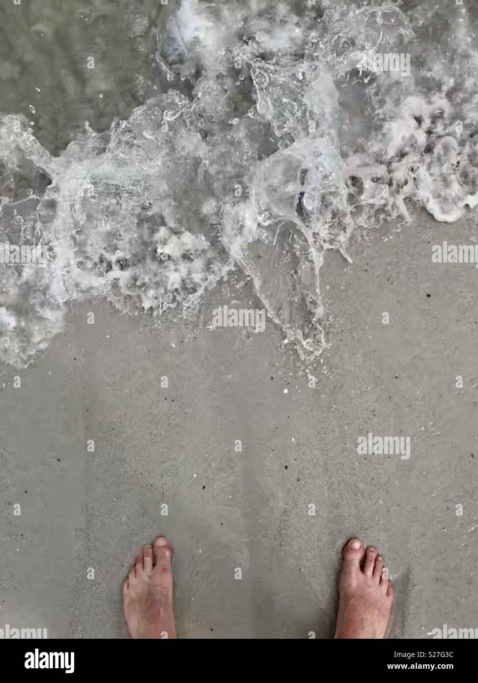 Feet and water Stock Photo - Alamy