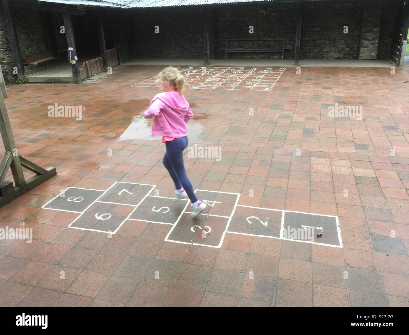 Jumping hopscotch hi-res stock photography and images - Alamy