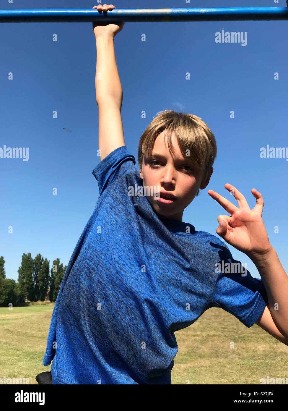 Boy hanging hi-res stock photography and images - Alamy