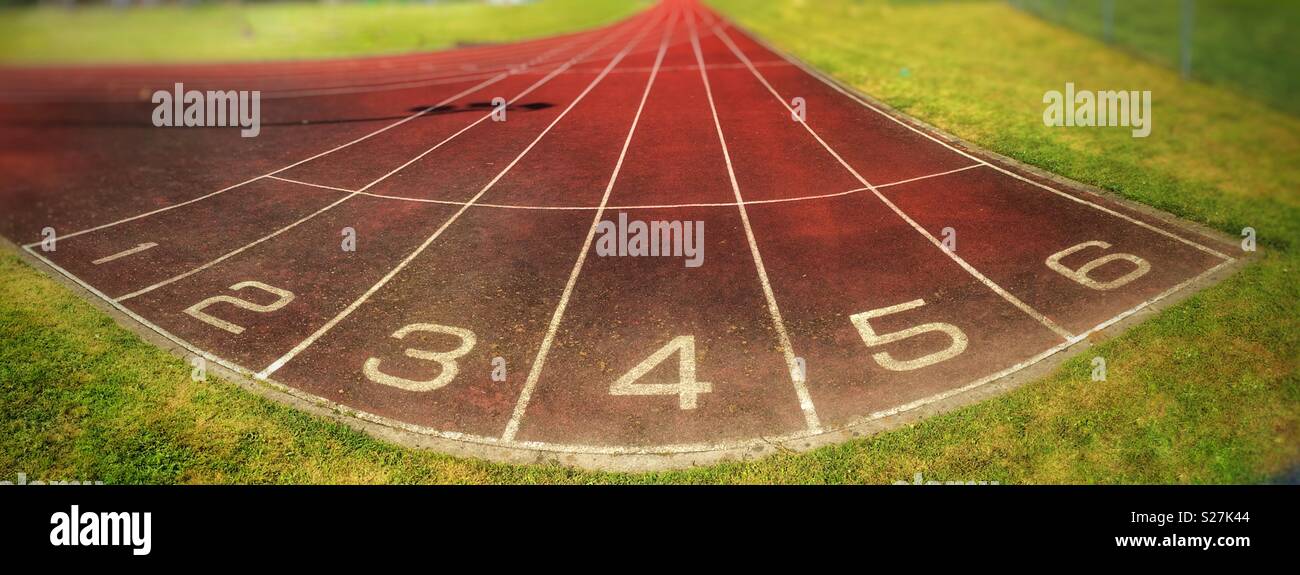 Starting lanes of running track Stock Photo - Alamy