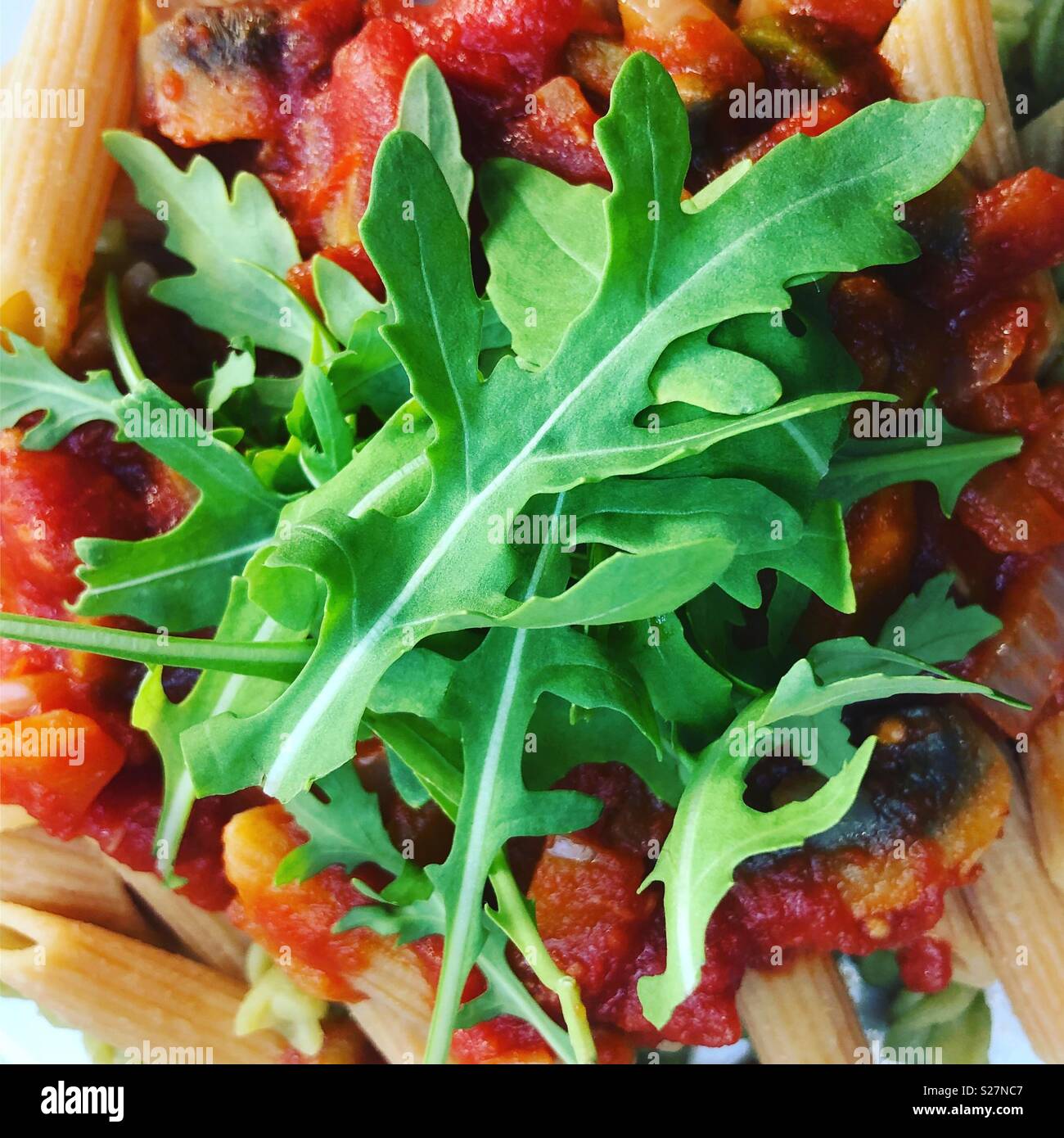 Tomato pasta with rocket Stock Photo - Alamy