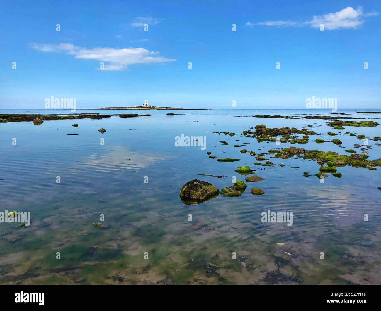 Sky reflection in the North Sea near Coquet Island lighthouse Stock ...