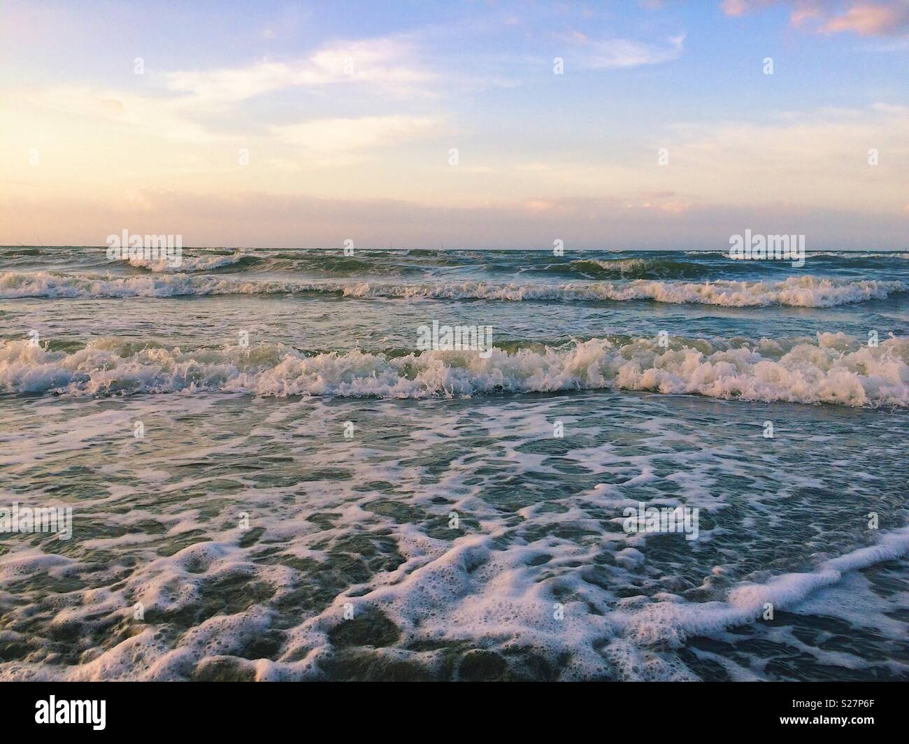 Running into waves hi-res stock photography and images - Alamy