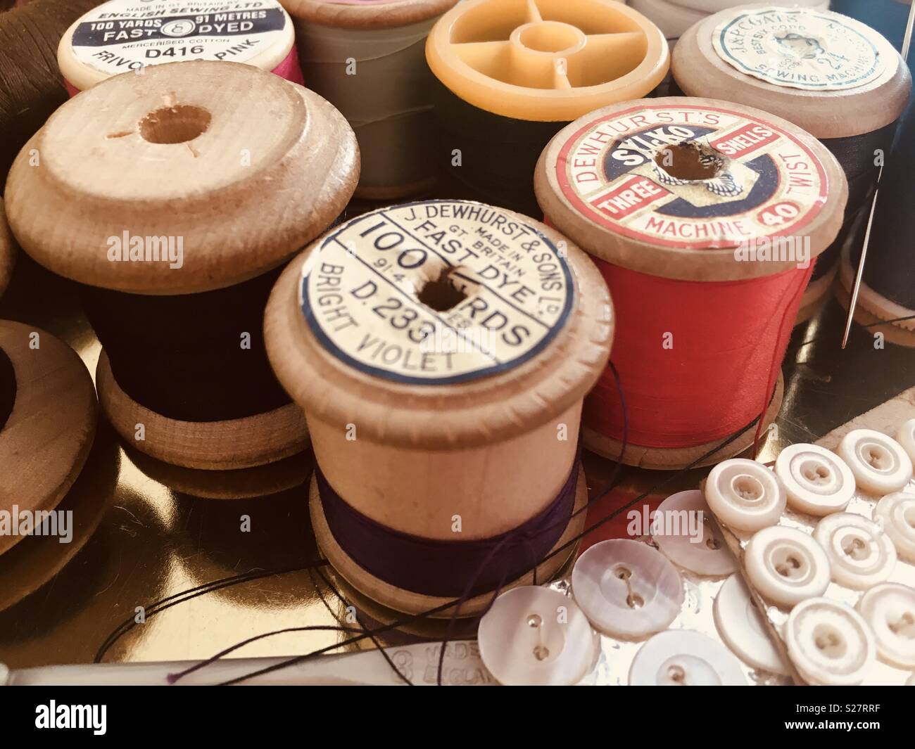 Vintage threads and buttons Stock Photo - Alamy