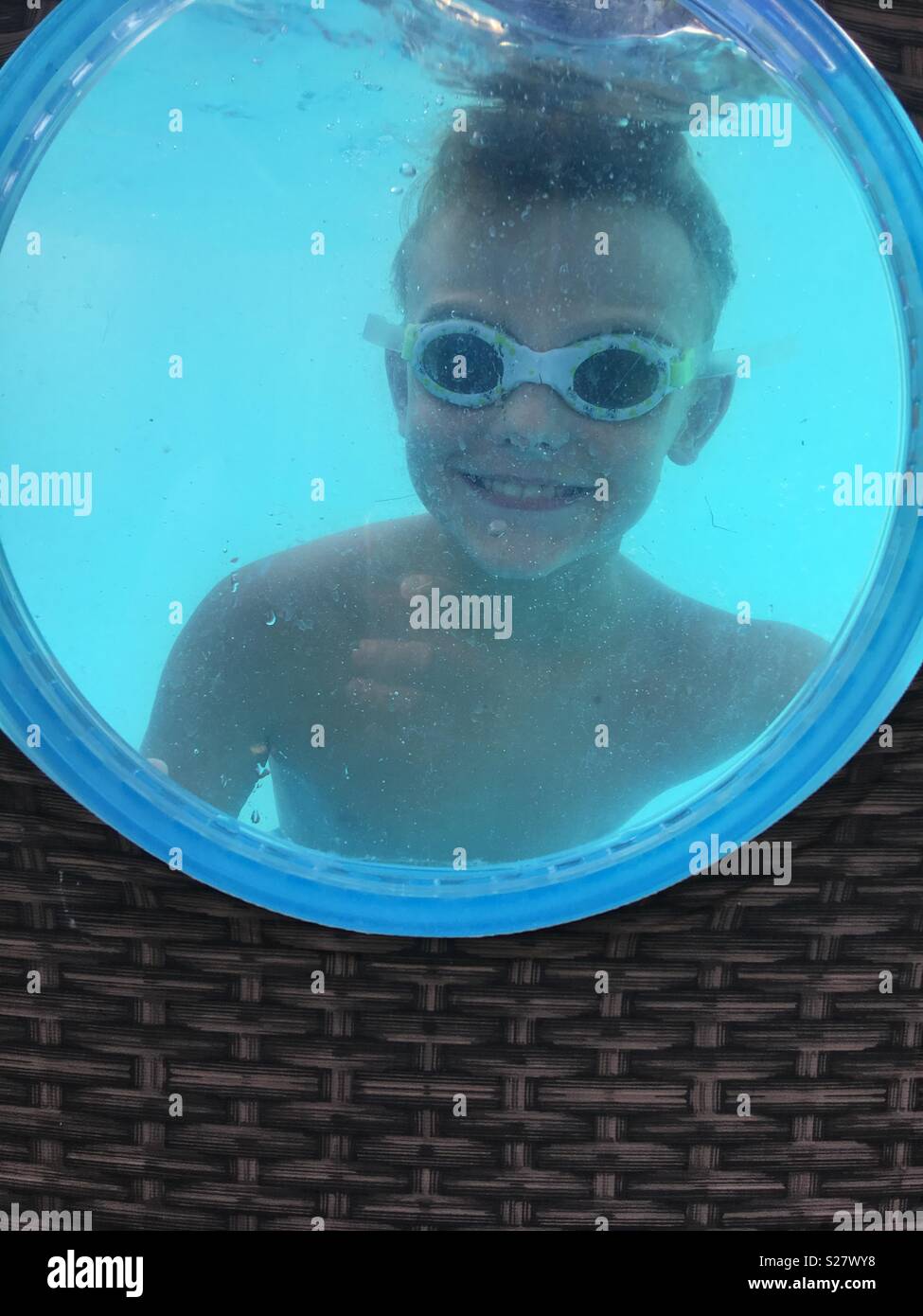 Looking through the window under water Stock Photo - Alamy