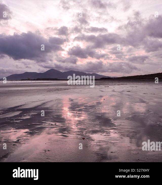 Beach with beautiful sky and reflection Stock Photo - Alamy