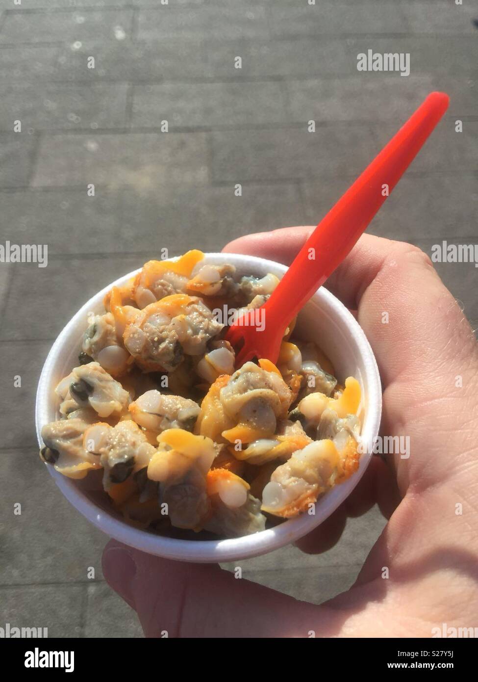 Cockles at the seafront Stock Photo - Alamy