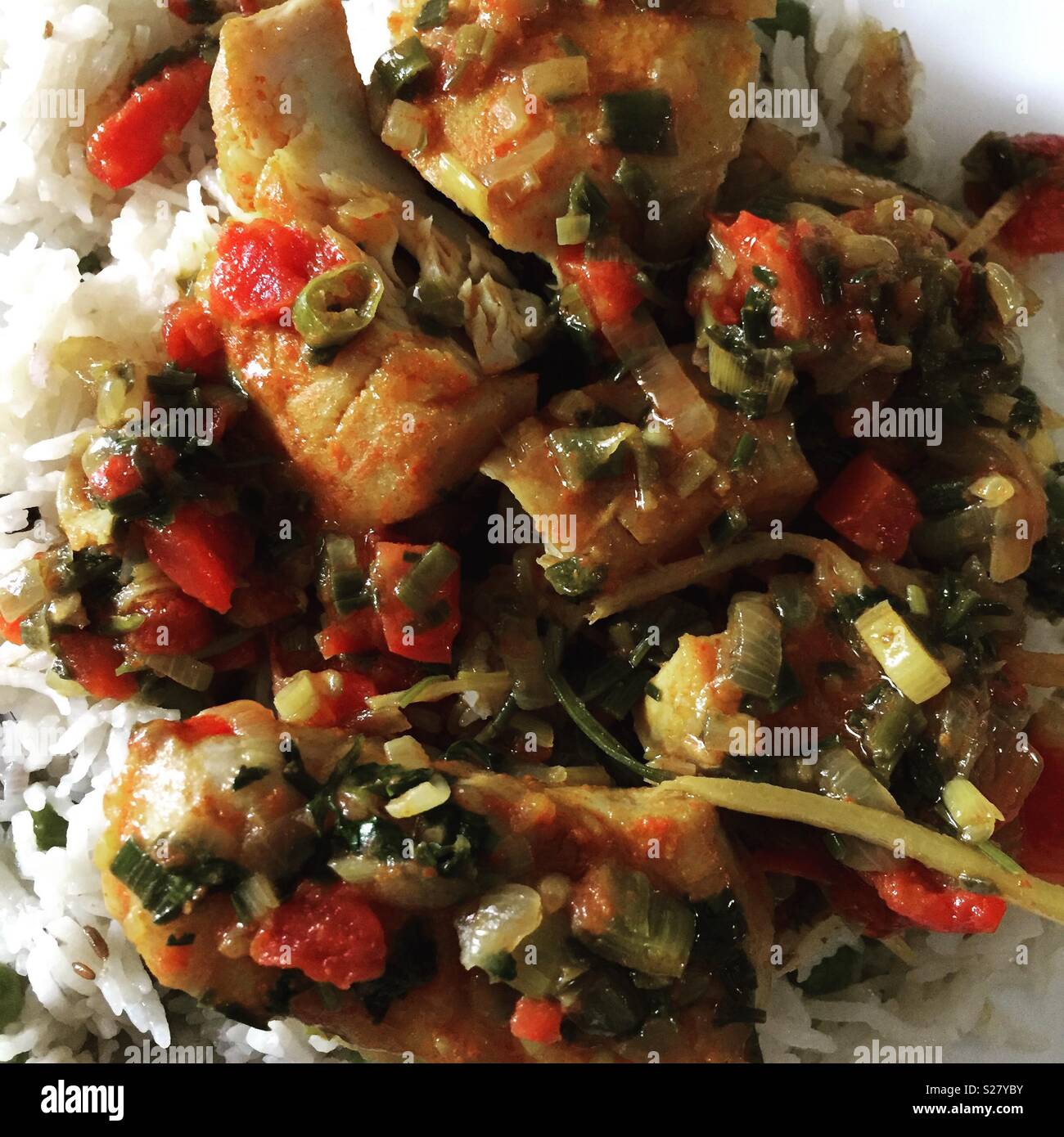 Fish, ginger, garlic, greens with rice Stock Photo - Alamy