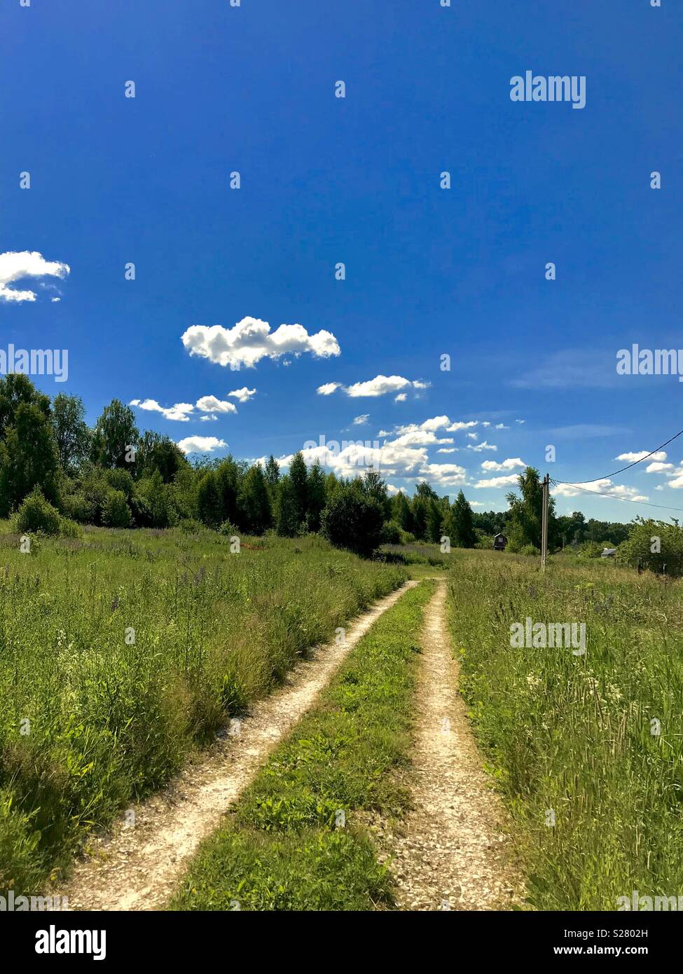 road with clouds Stock Photo - Alamy