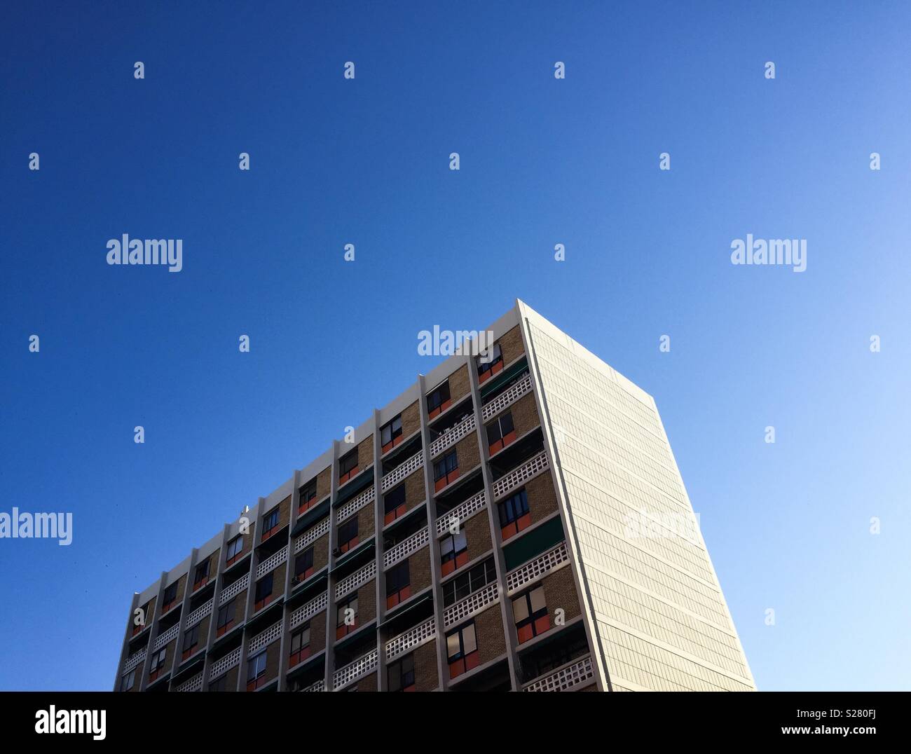 High building and blue sky Stock Photo - Alamy