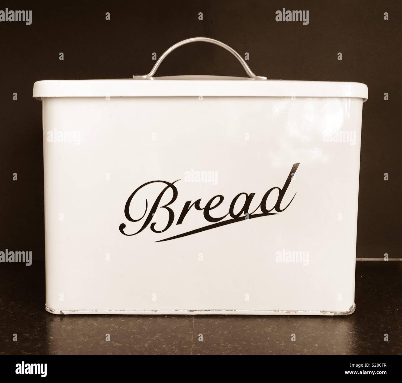 Vintage enamel bread storage tin Stock Photo - Alamy
