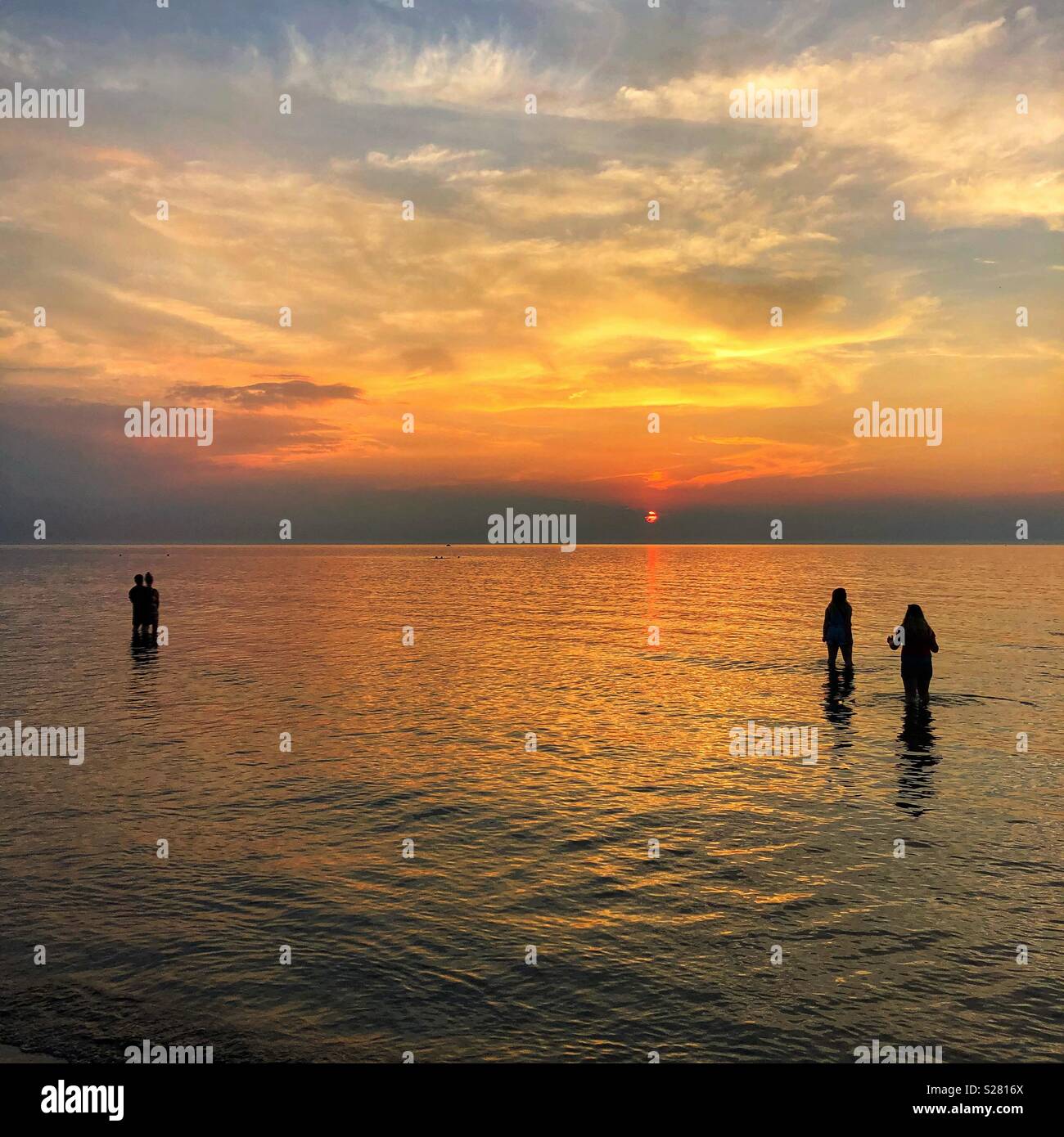 Watching the sun go down hi-res stock photography and images - Alamy