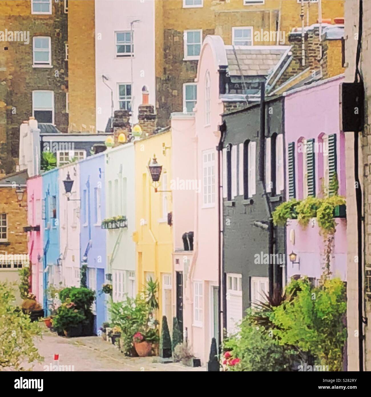 Different colour houses hi-res stock photography and images - Alamy
