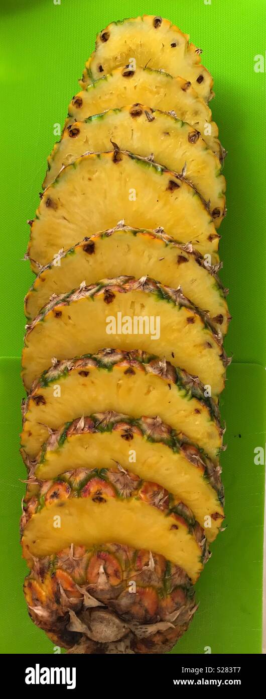 Fresh sliced pineapple wheels Stock Photo - Alamy