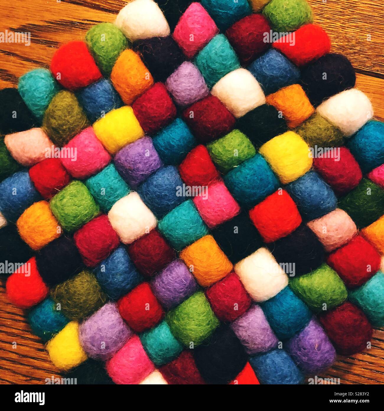 Bright multi-coloured coaster Stock Photo - Alamy