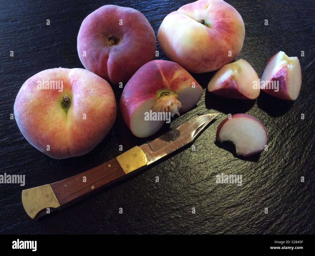 Flat peaches hi-res stock photography and images - Alamy