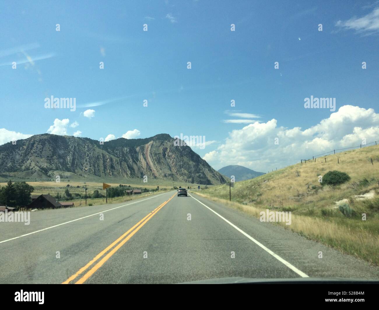 Driving car on empty road hi-res stock photography and images - Alamy