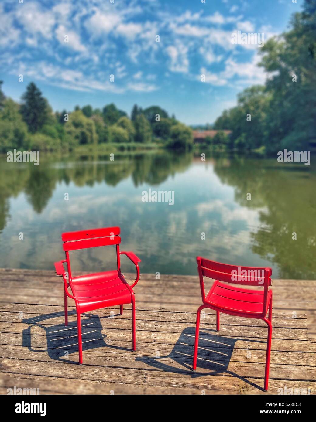 Two red chairs hi-res stock photography and images - Alamy