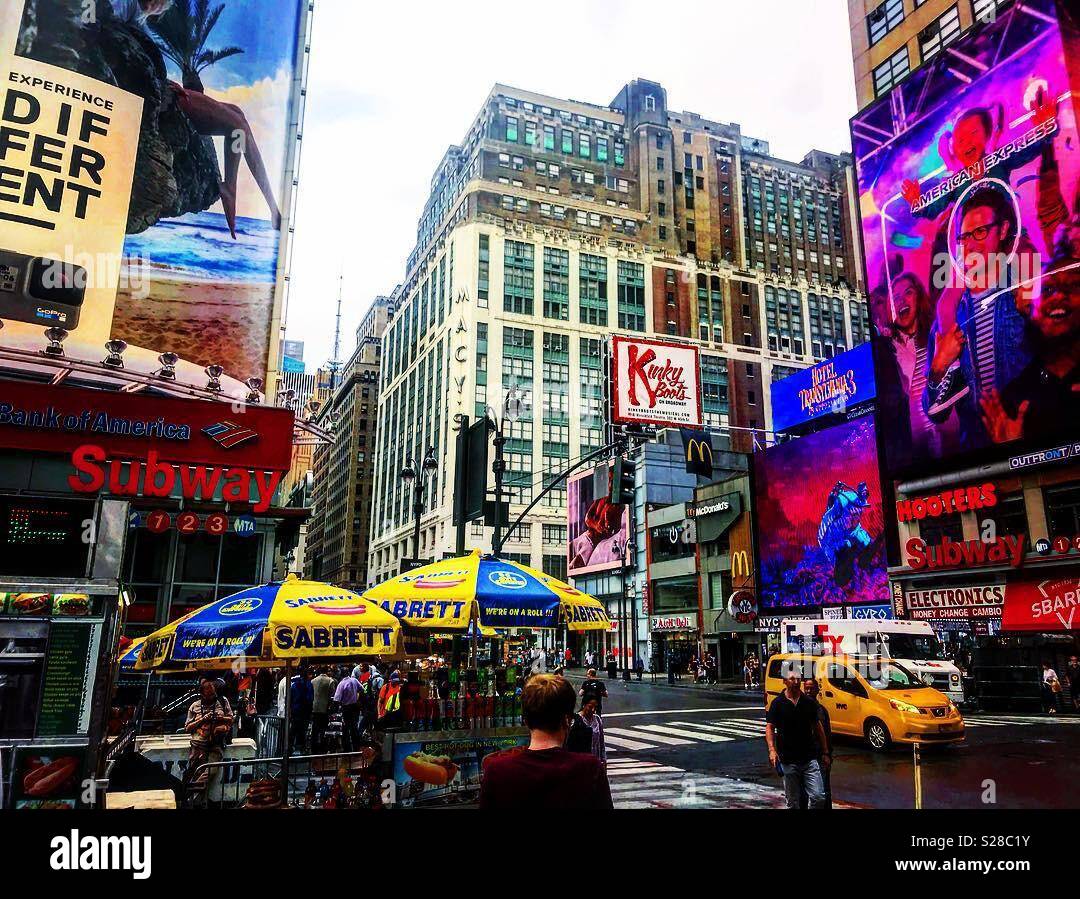 In the middle of the action - NYC Stock Photo - Alamy